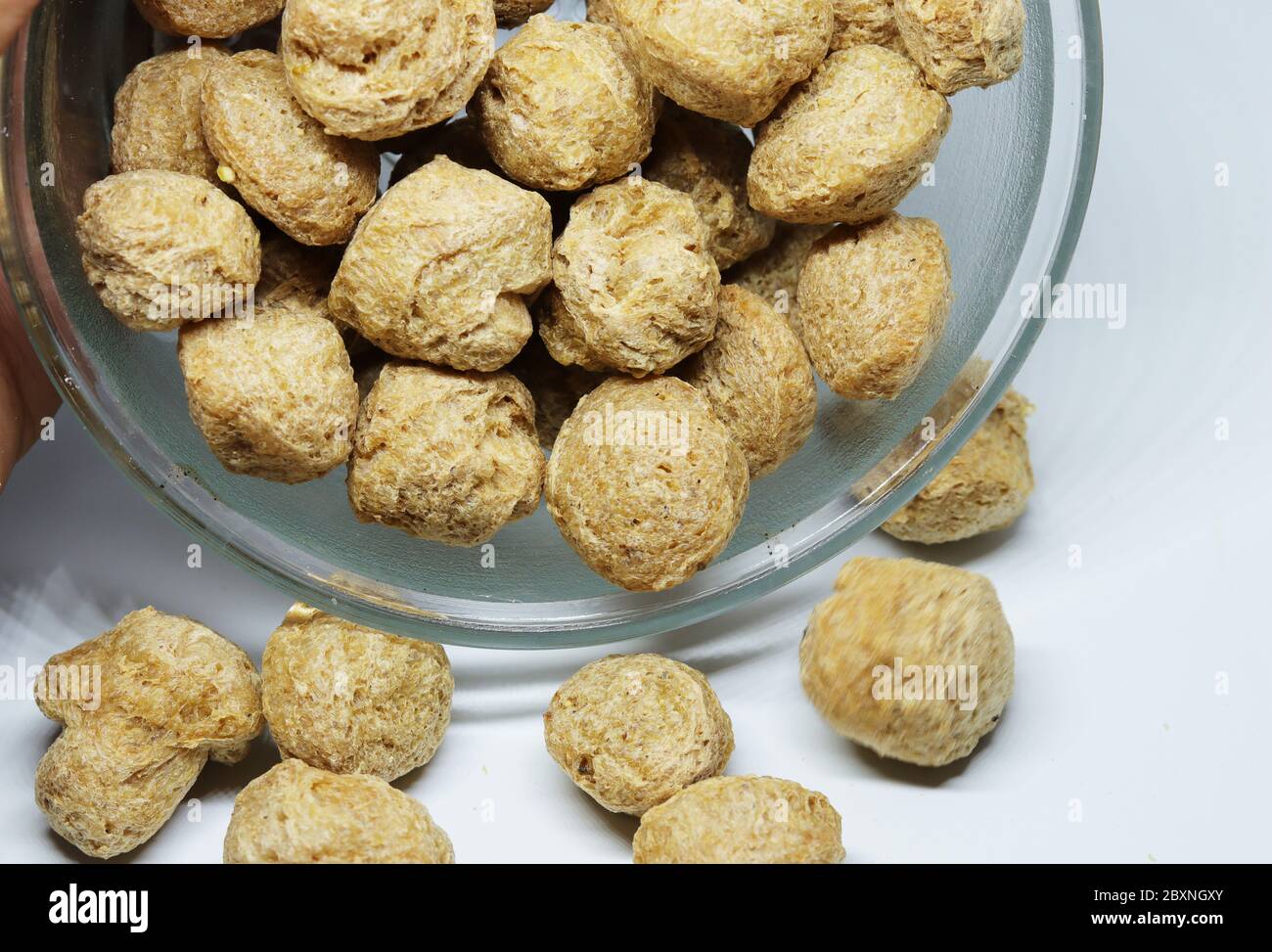 Soya protein chunks used in vegetarian and vegan food, isolated on a ...