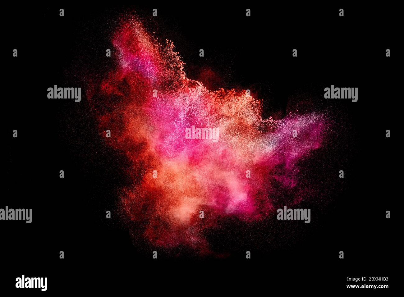 Colorful dust particle explosion resembling a pyrotechnic effect over ...