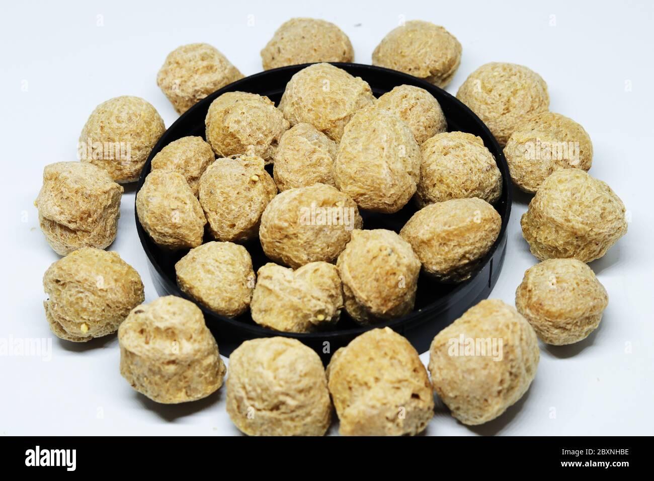Soya protein chunks used in vegetarian and vegan food, isolated on a ...