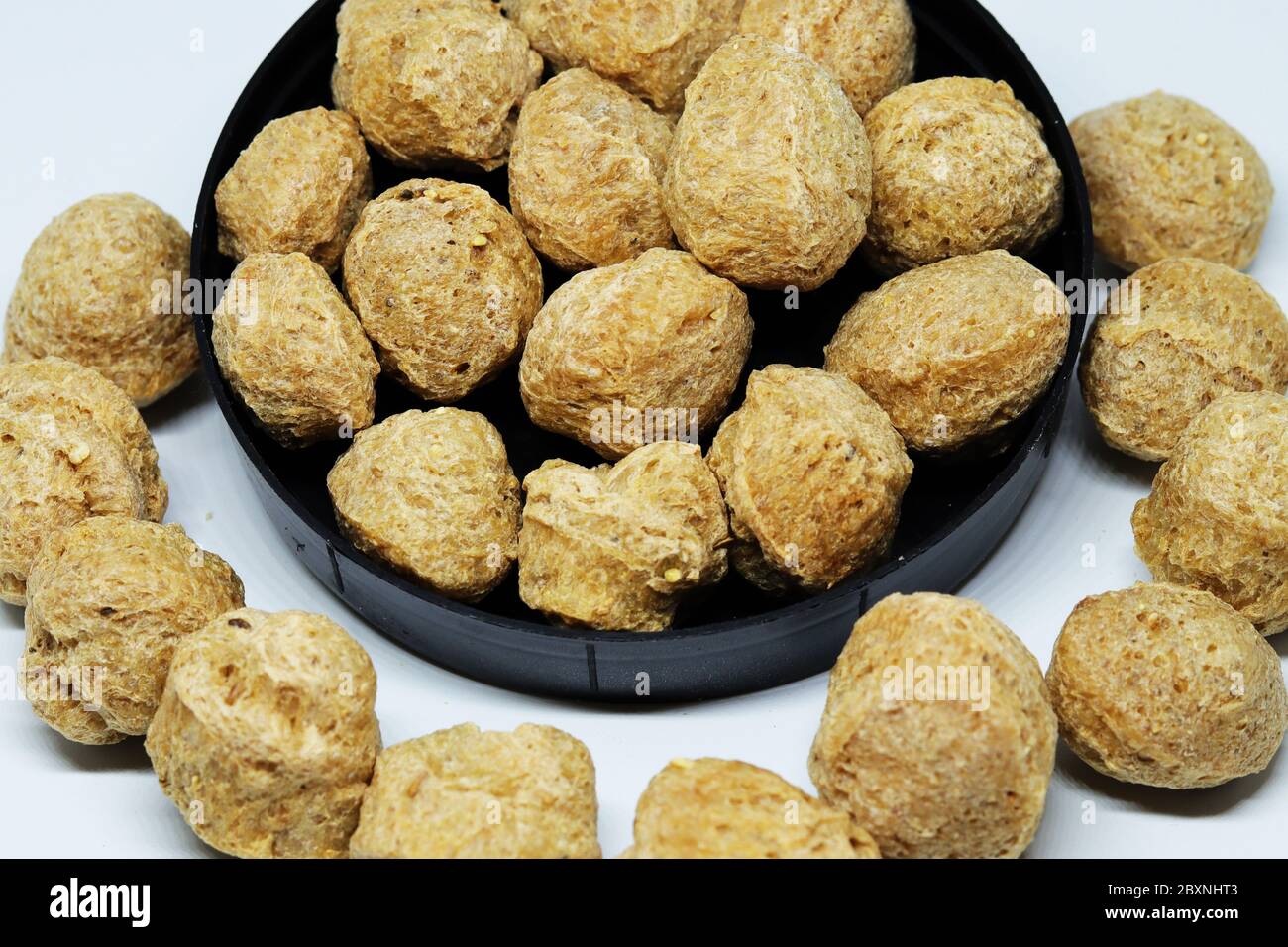 Soya protein chunks used in vegetarian and vegan food, isolated on a ...