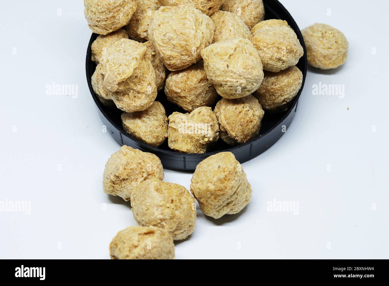 Soya protein chunks used in vegetarian and vegan food, isolated on a ...