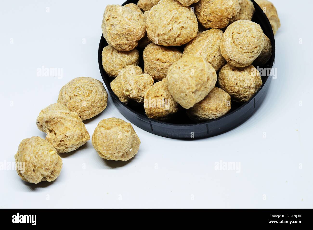 Soya protein chunks used in vegetarian and vegan food, isolated on a ...