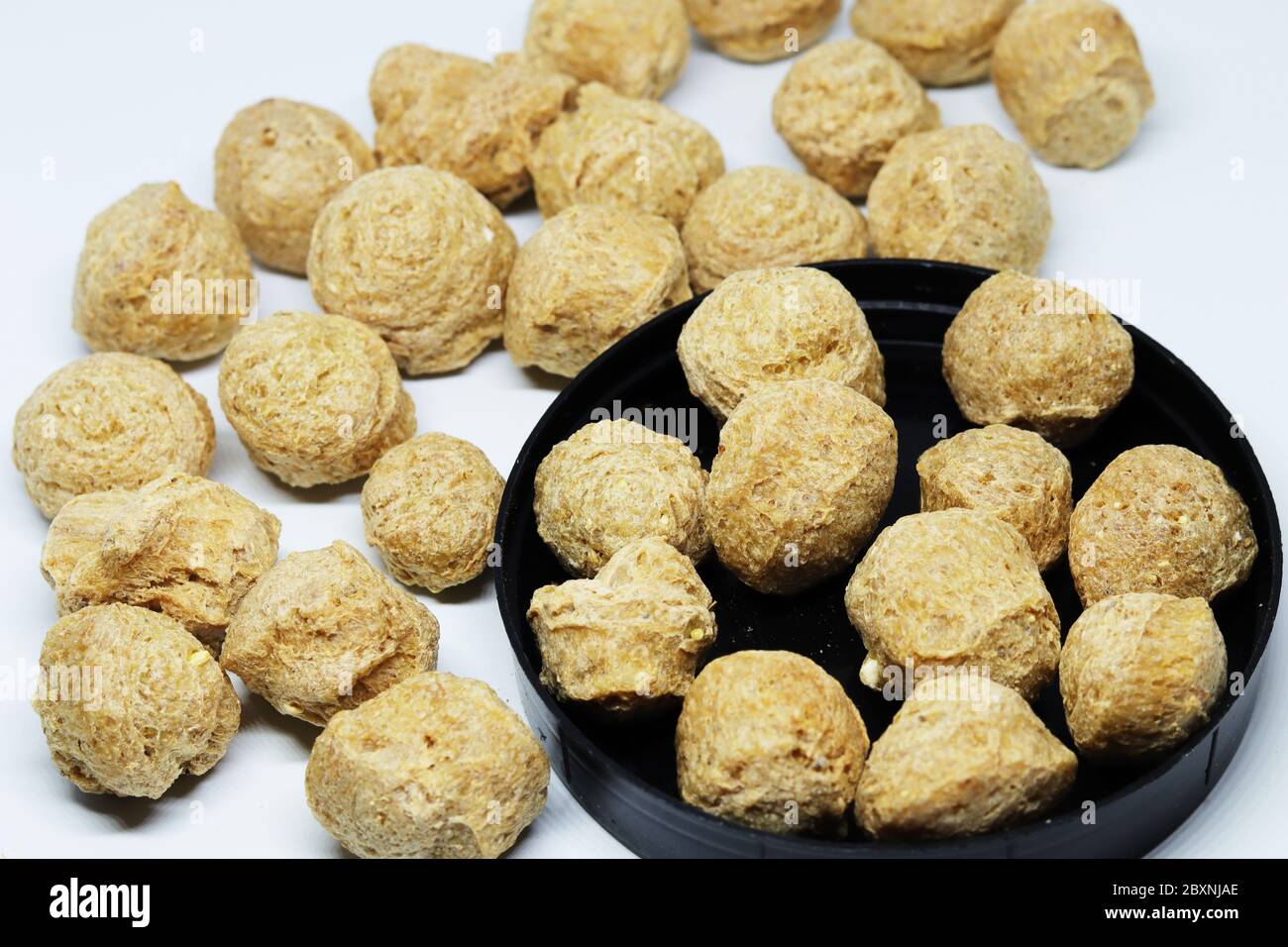 Soya protein chunks used in vegetarian and vegan food, isolated on a ...