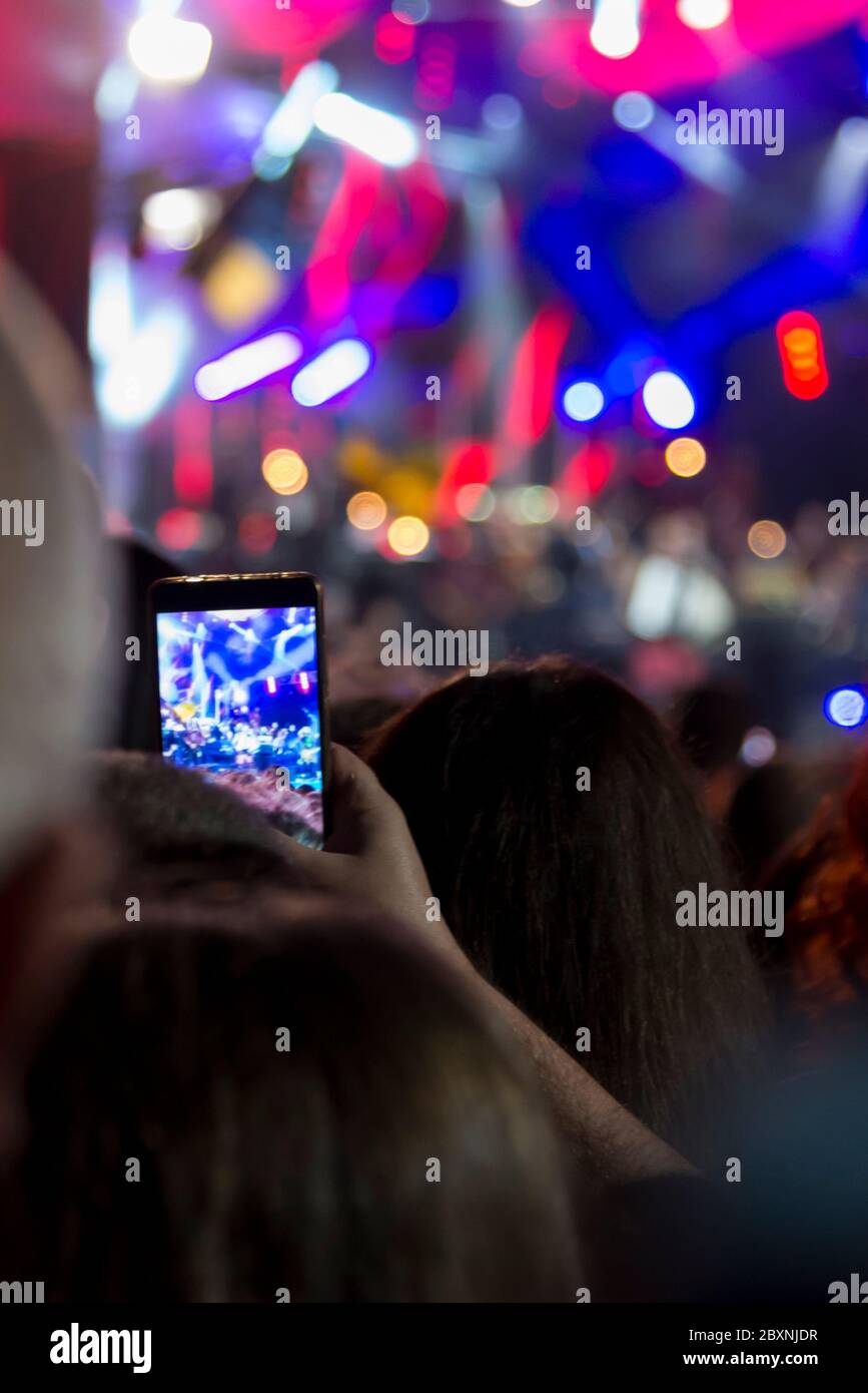 People hold smart phones and take pictures at night Stock Photo - Alamy