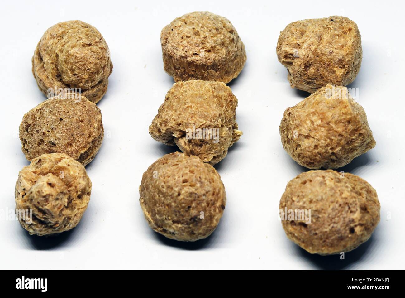 Soya protein chunks used in vegetarian and vegan food, isolated on a ...