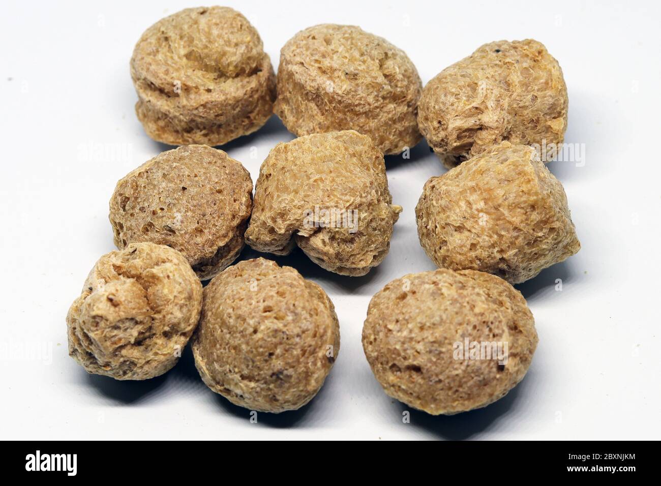 Soya protein chunks used in vegetarian and vegan food, isolated on a ...