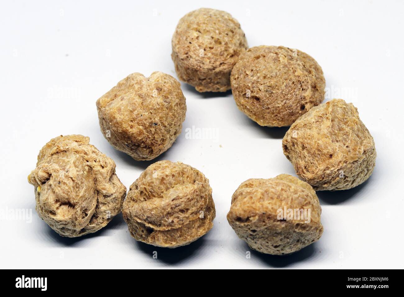 Soya protein chunks used in vegetarian and vegan food, isolated on a ...