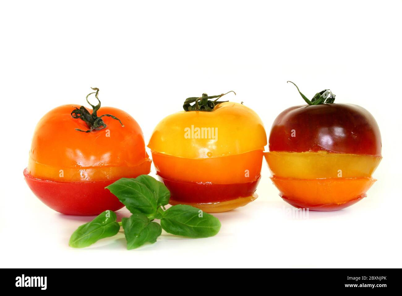 Layers of multicolored tomatoes Stock Photo - Alamy