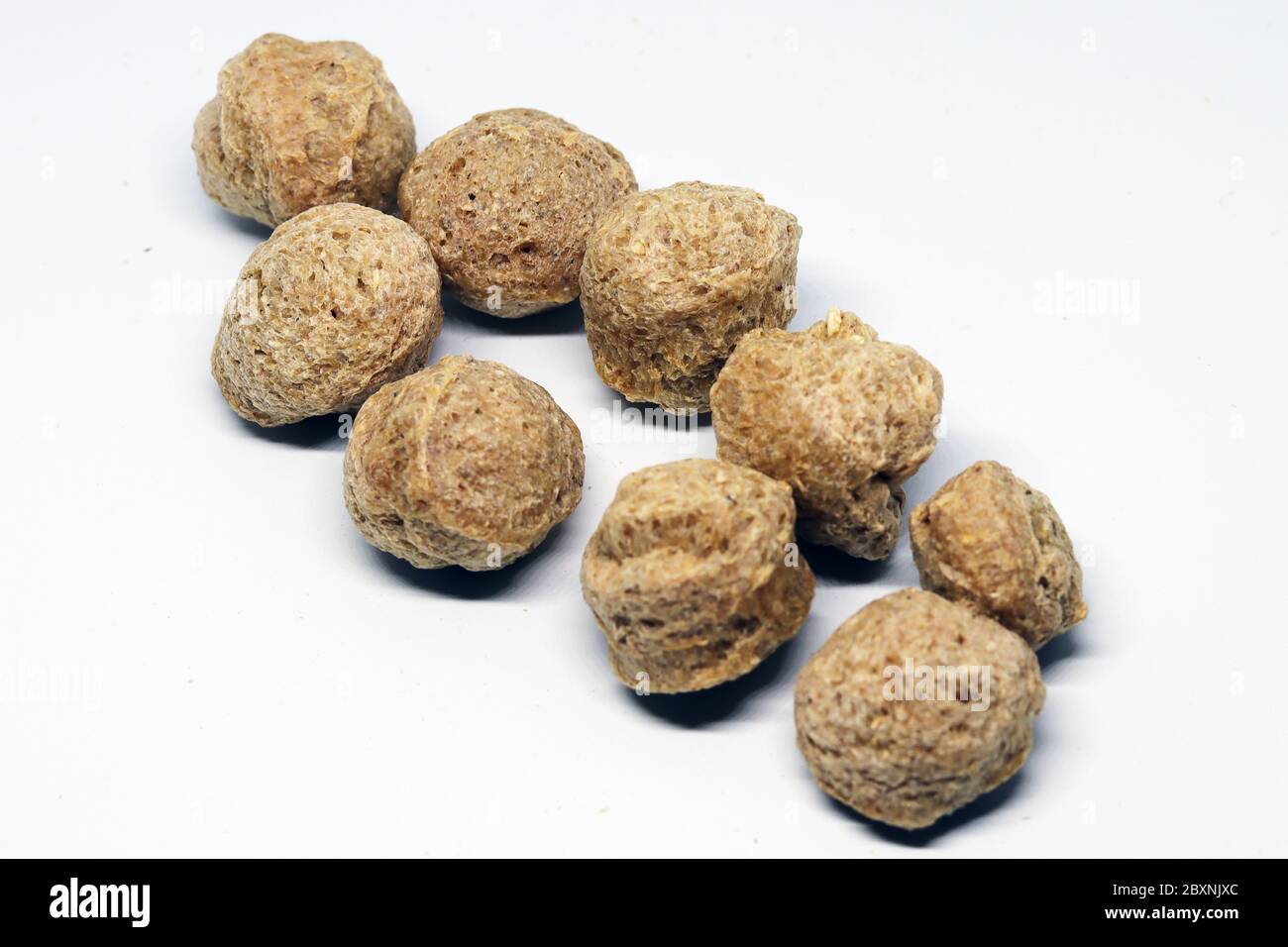 Soya protein chunks used in vegetarian and vegan food, isolated on a ...