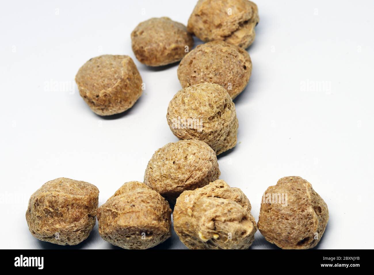 Soya protein chunks used in vegetarian and vegan food, isolated on a ...