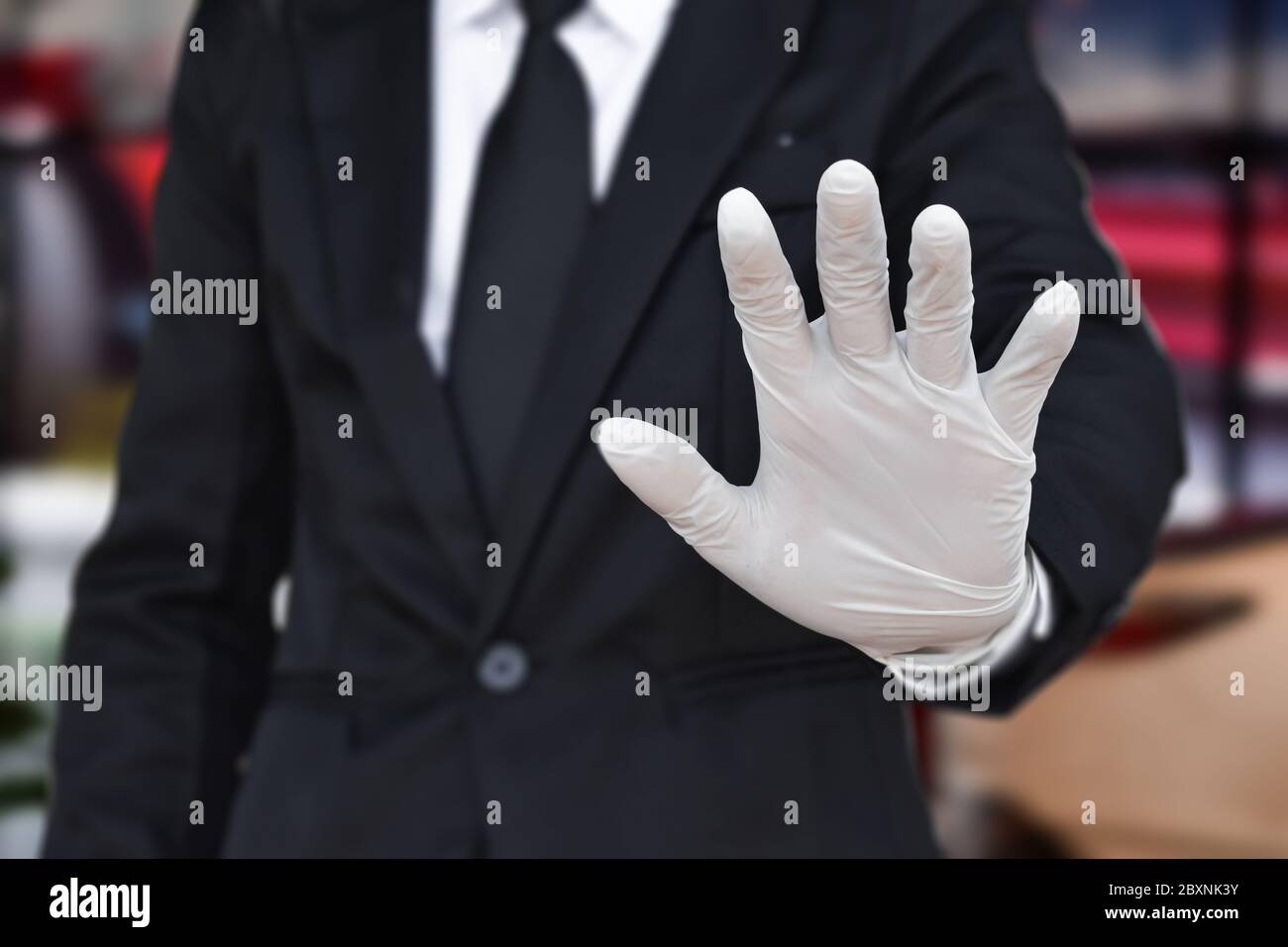 Hand stop suit hi-res stock photography and images - Alamy