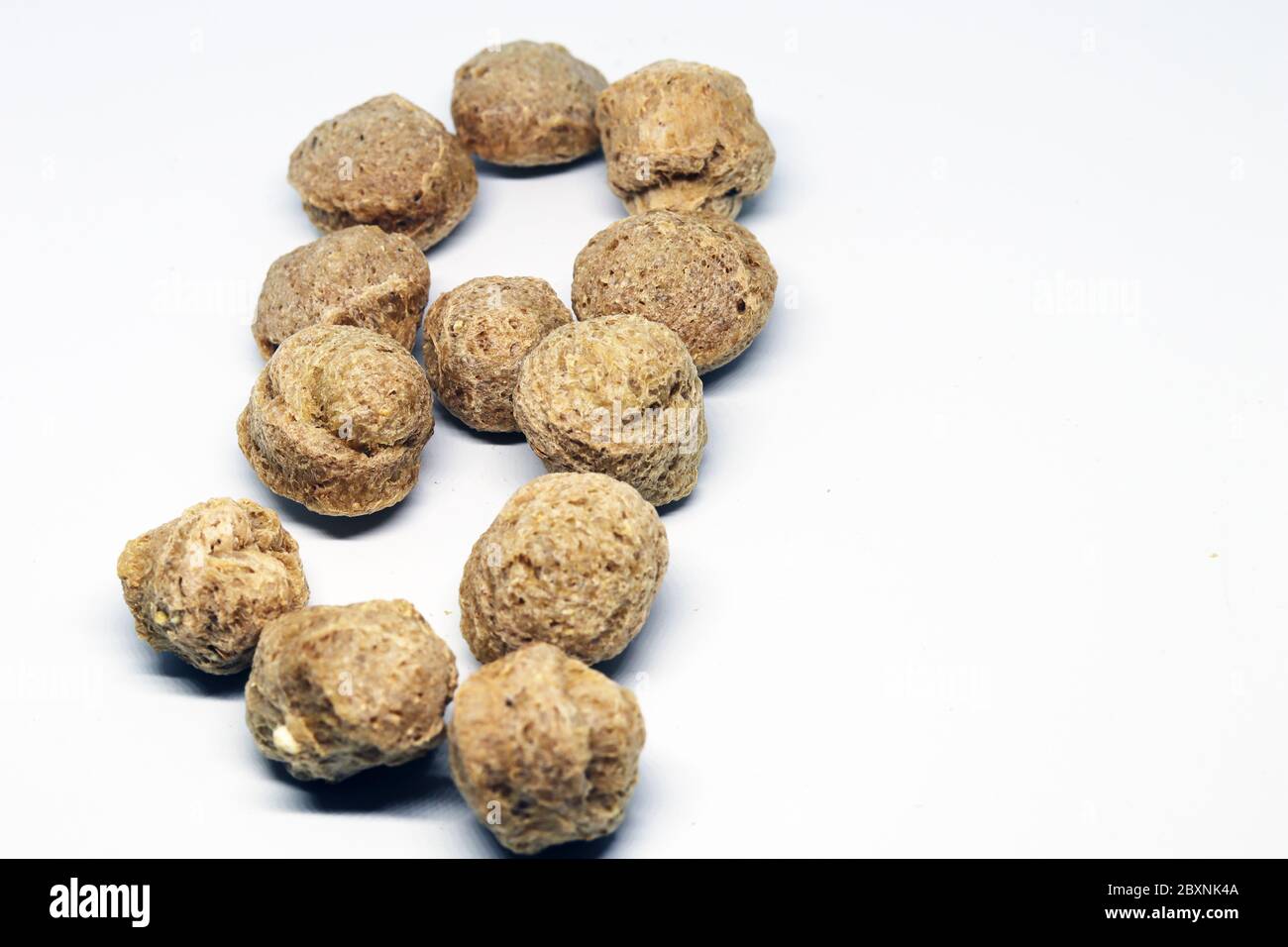 Soya protein chunks used in vegetarian and vegan food, isolated on a ...