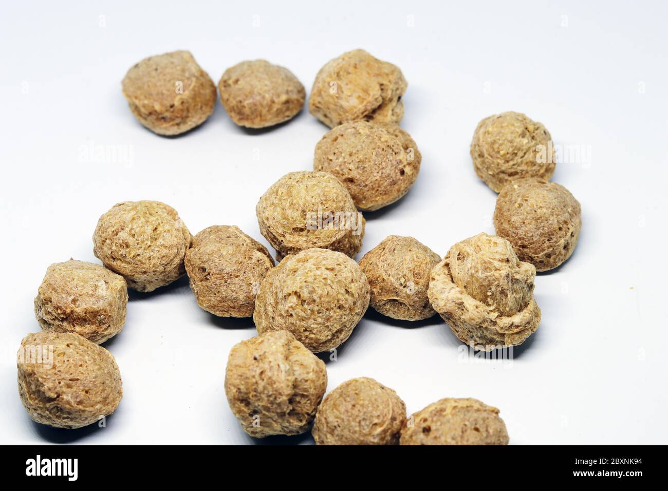 Soya protein chunks used in vegetarian and vegan food, isolated on a ...