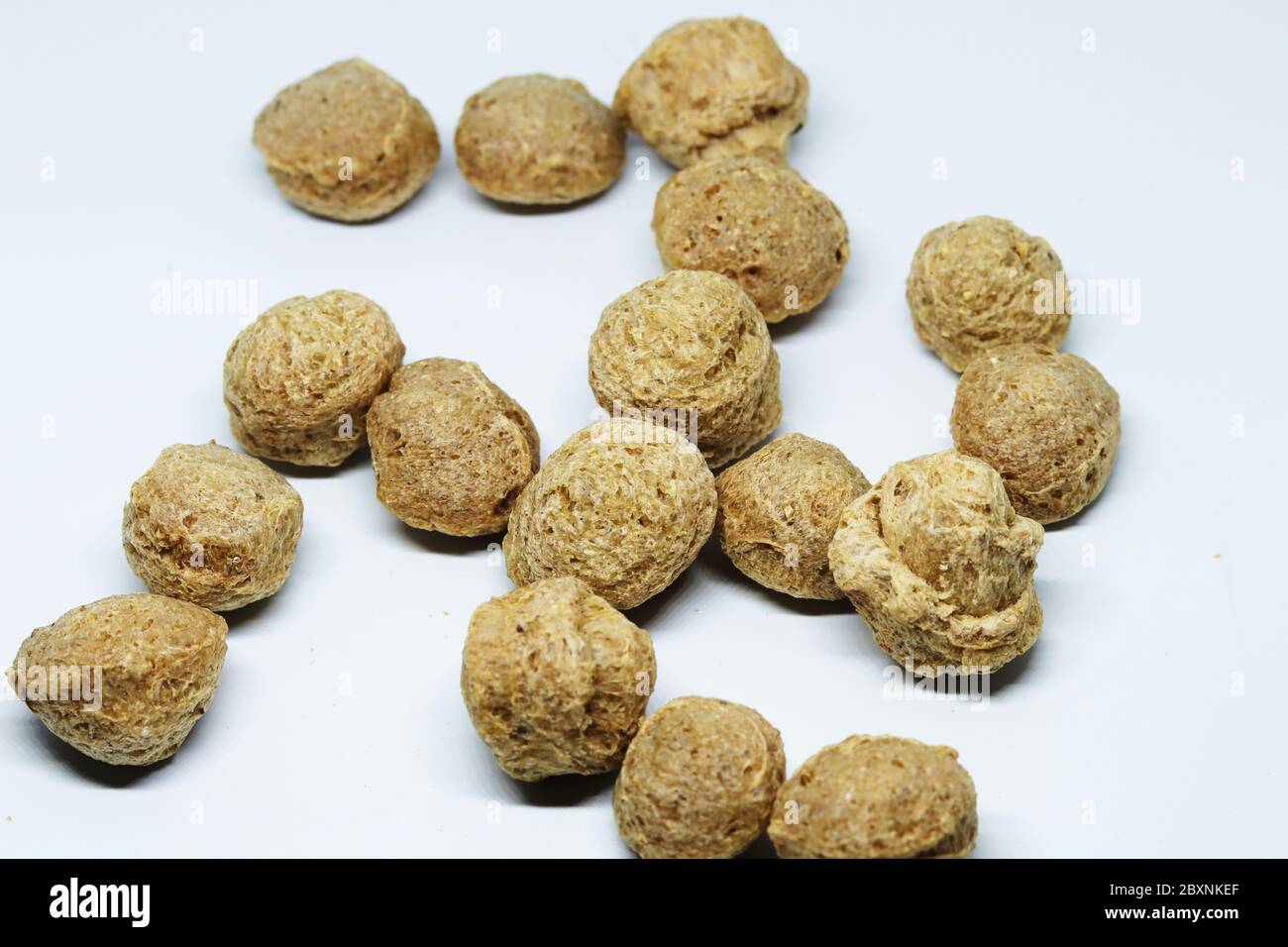 Soya protein chunks used in vegetarian and vegan food, isolated on a ...