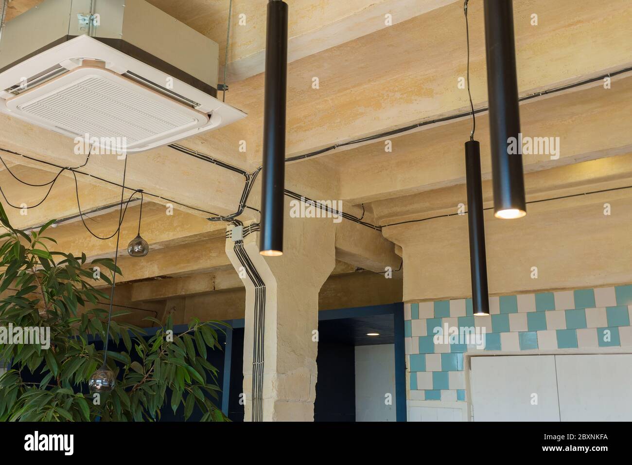 modern glass and metal loft lamps in a design office Stock Photo - Alamy