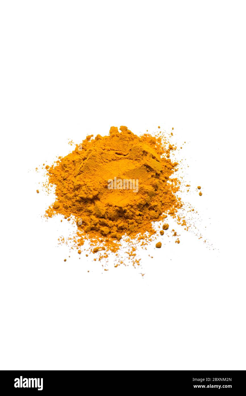 Turmeric powder isolated on white background Stock Photo - Alamy