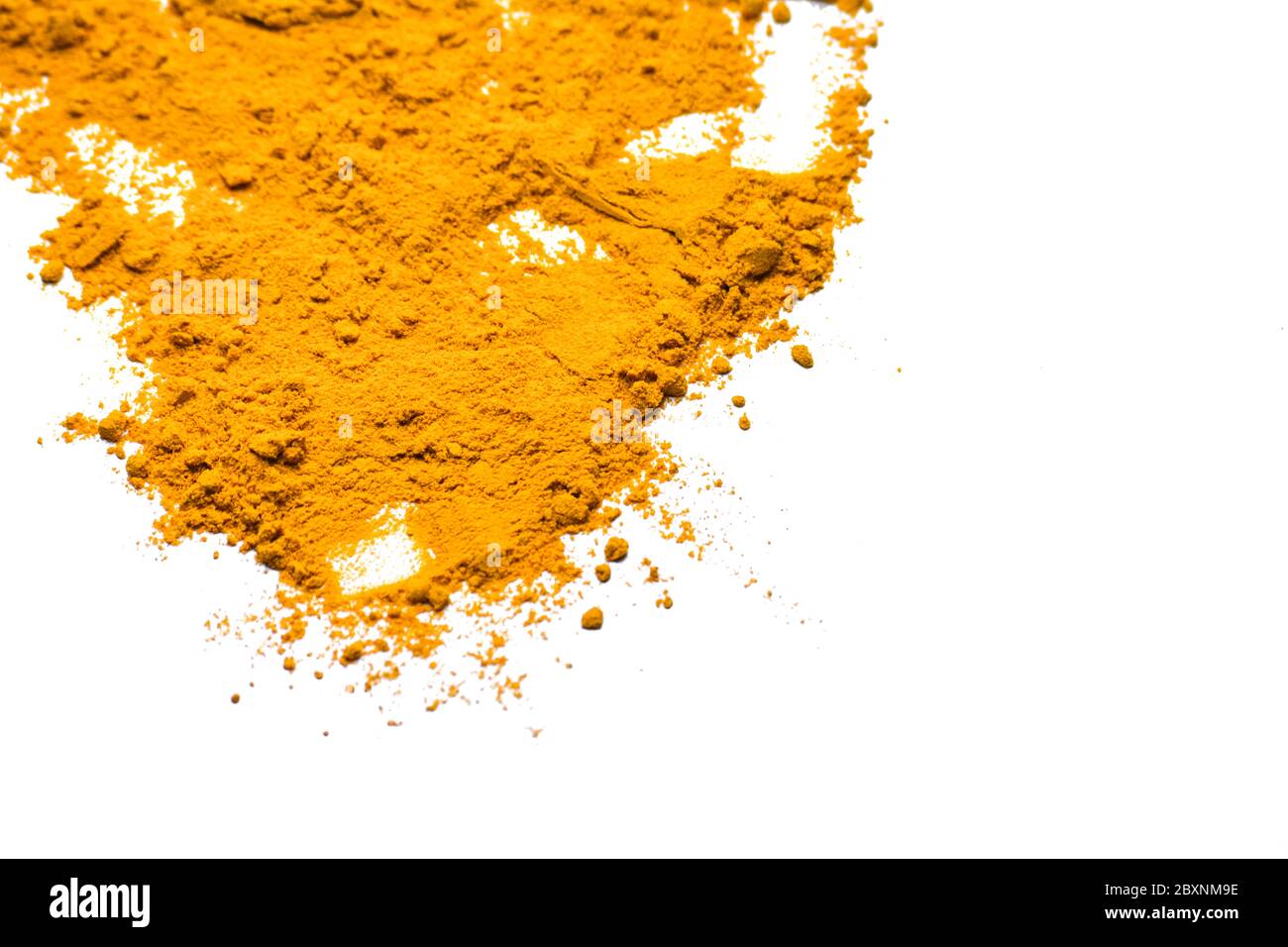 Turmeric powder isolated on white background Stock Photo - Alamy
