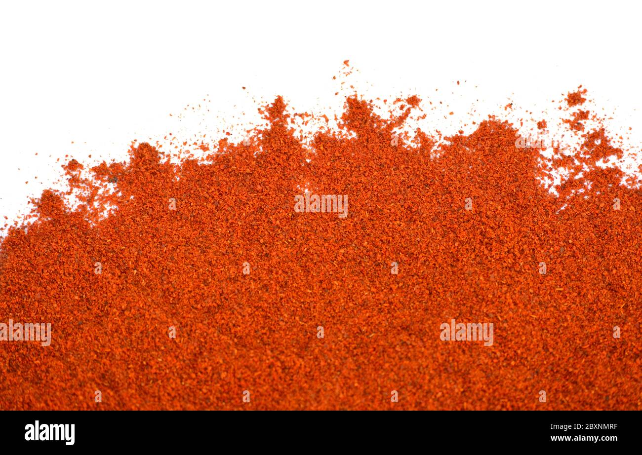 Red chili pepper powder isolated on white background Stock Photo - Alamy