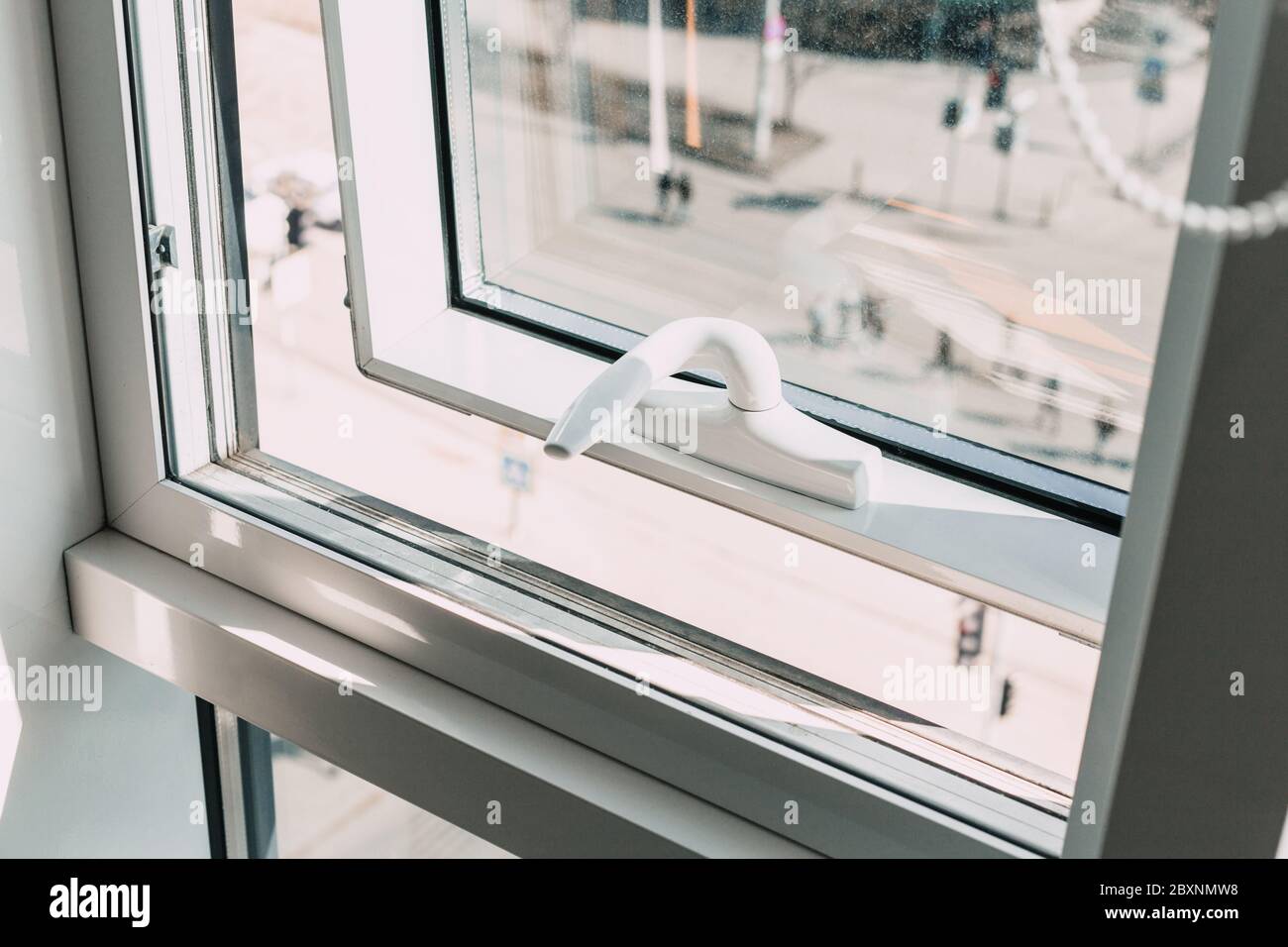 modern plastic white window installed in an office or apartment ...