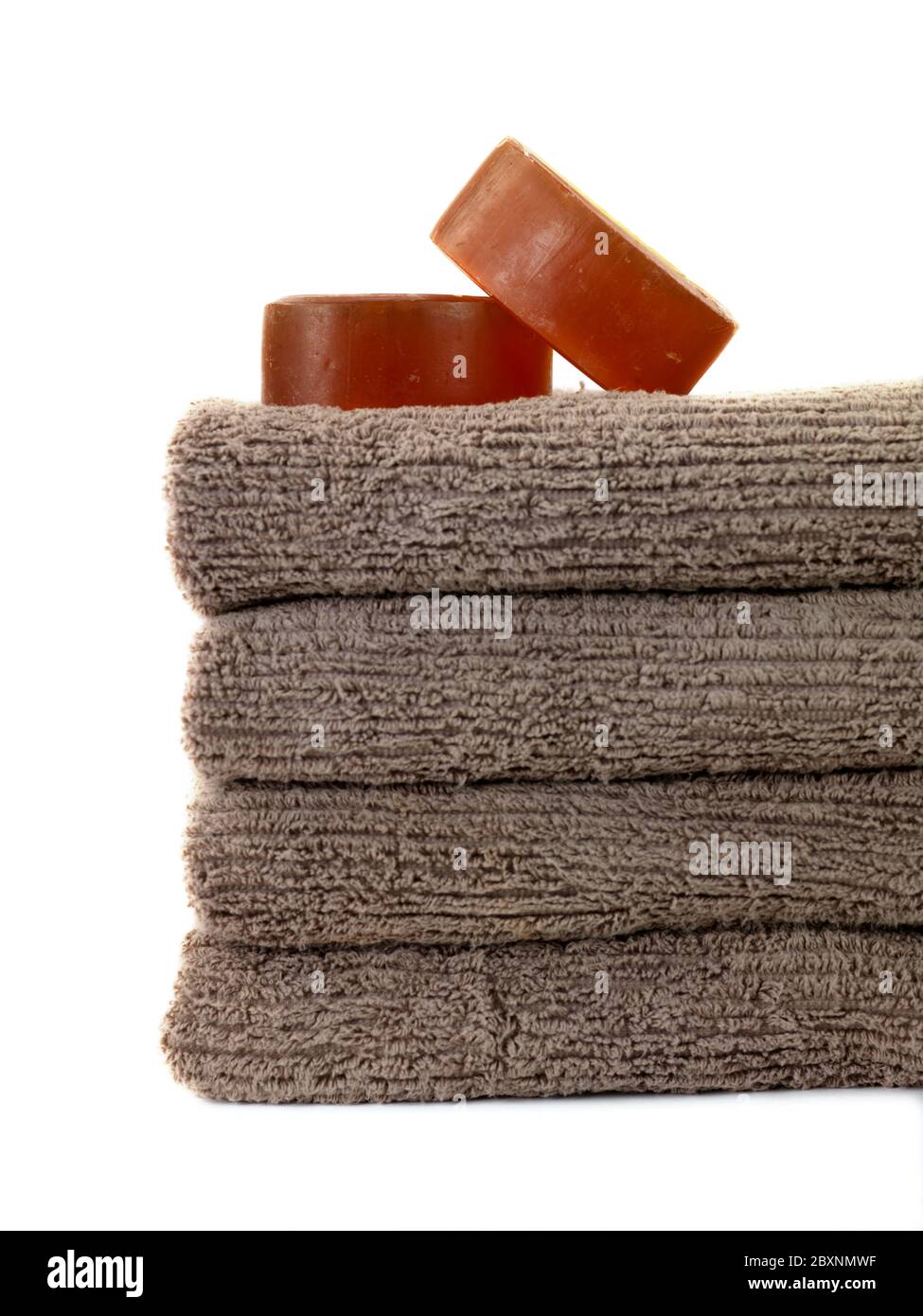 A stack of bath towels isolated against a white background Stock Photo ...