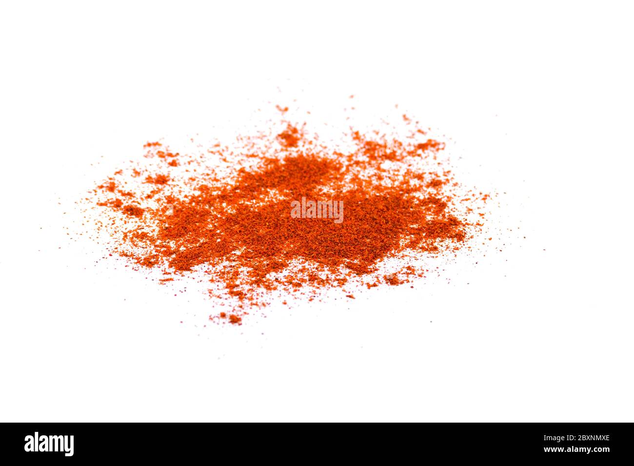 Red chili pepper powder isolated on white background Stock Photo - Alamy