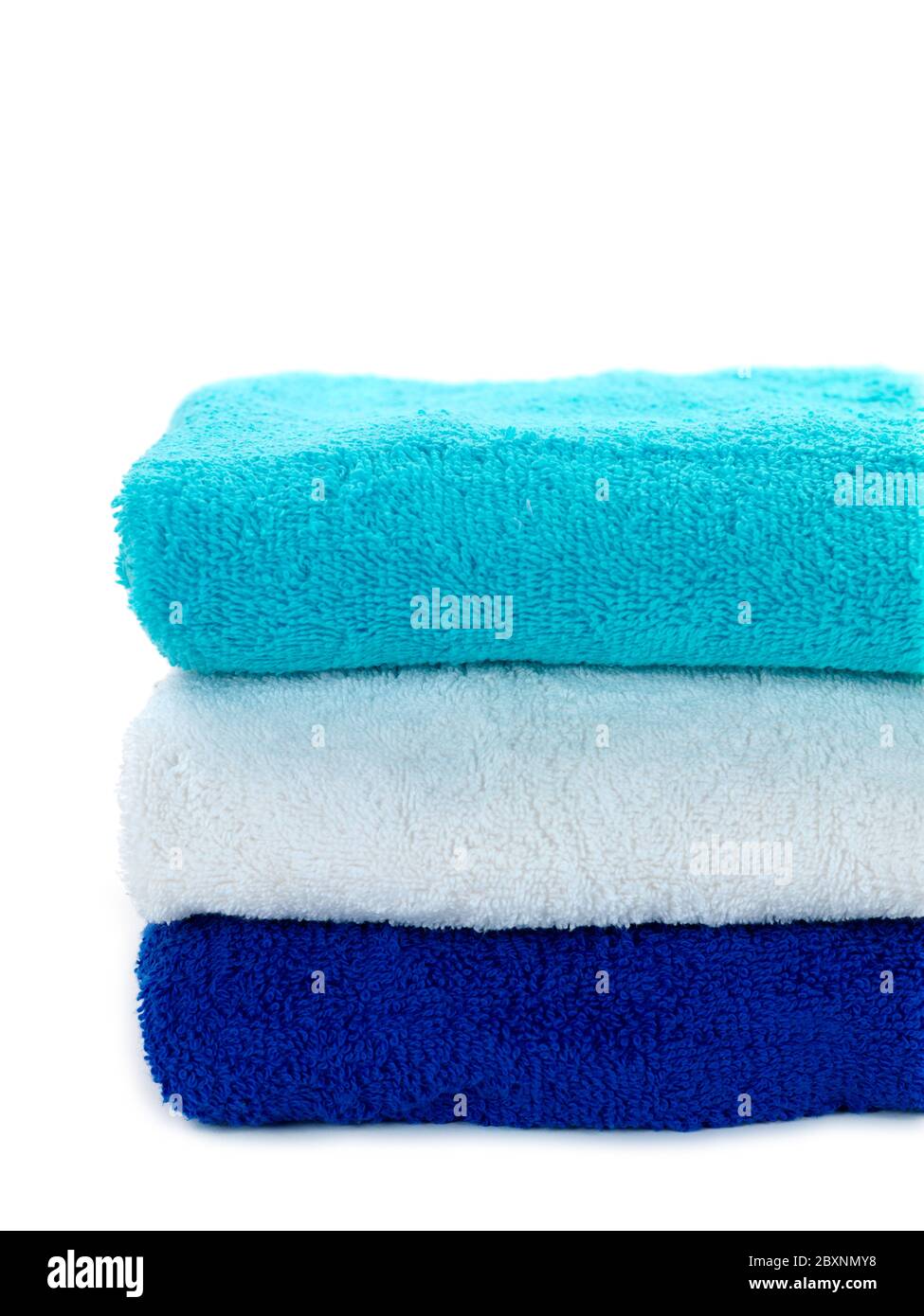 A stack of bath towels isolated against a white background Stock Photo ...