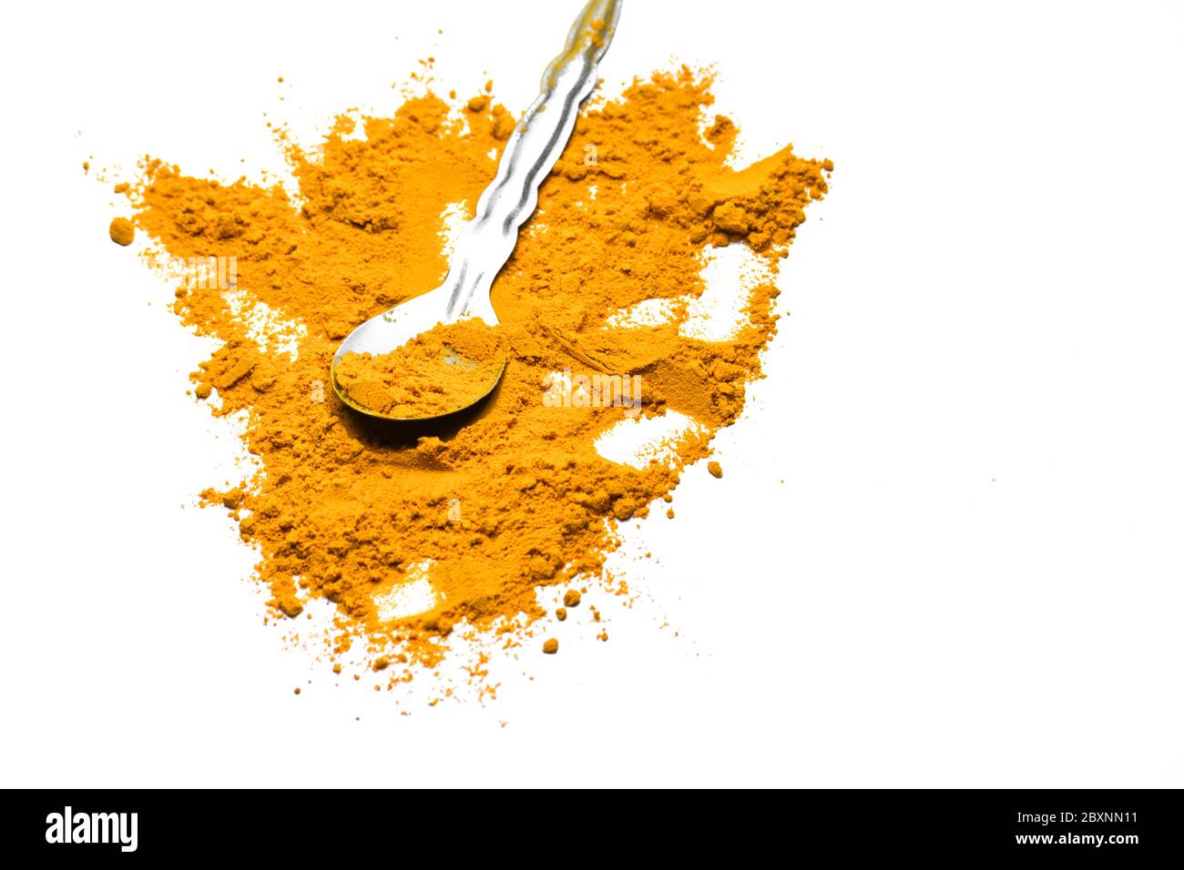Turmeric powder isolated on white background Stock Photo - Alamy