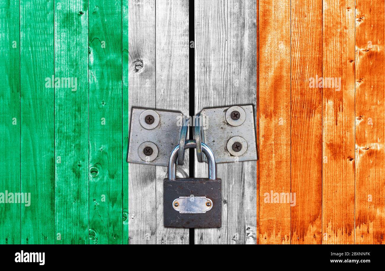 Ireland flag on door with padlock Stock Photo - Alamy