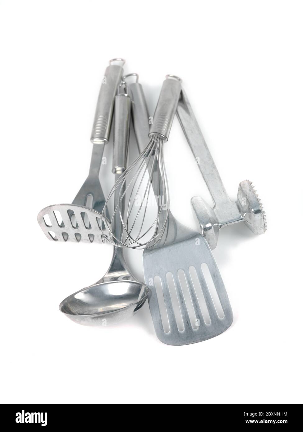 Kitchen utensils isolated against a white background Stock Photo - Alamy