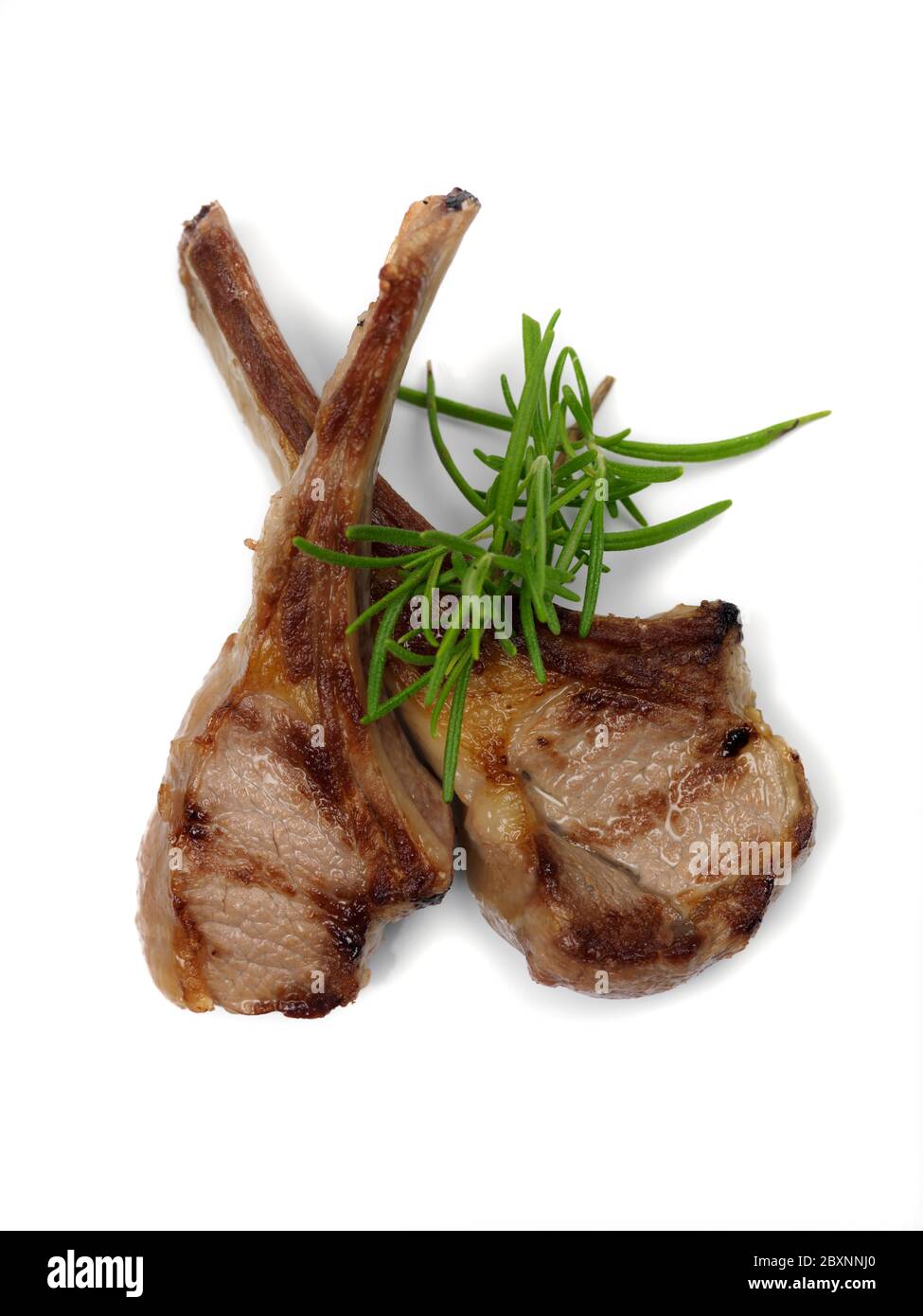 Cooked lamb chops isolated against a white background Stock Photo - Alamy