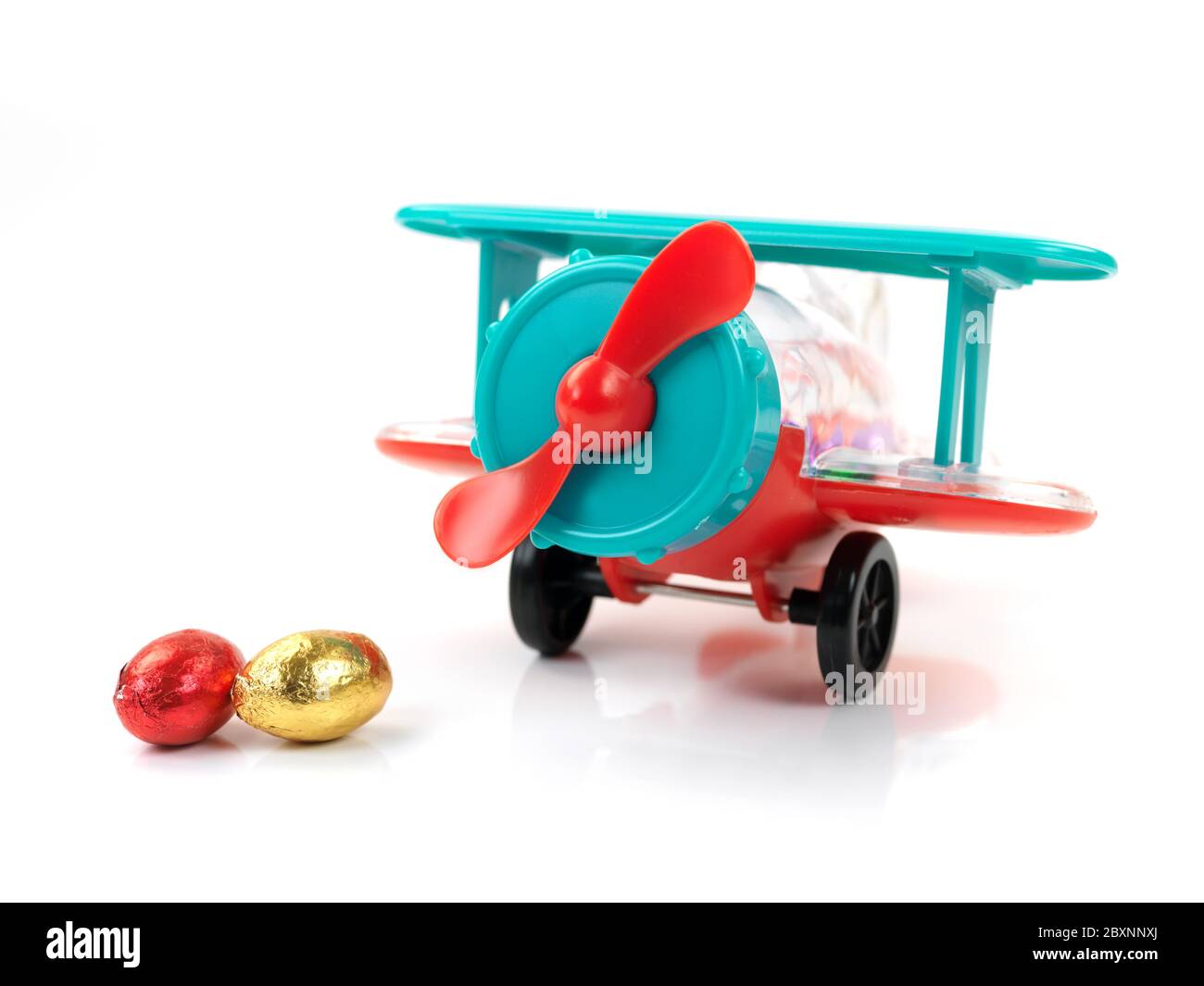 An aeroplane easter egg toy isolated against a white background Stock ...