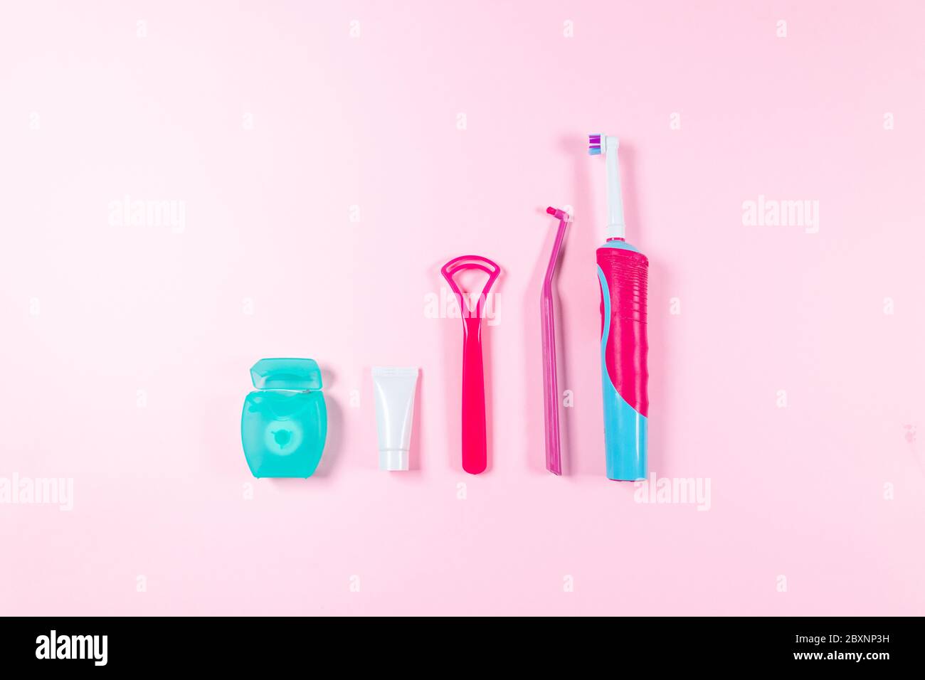 Ultrasonic pink toothbrush, dental floss and mouthwash and tongue ...