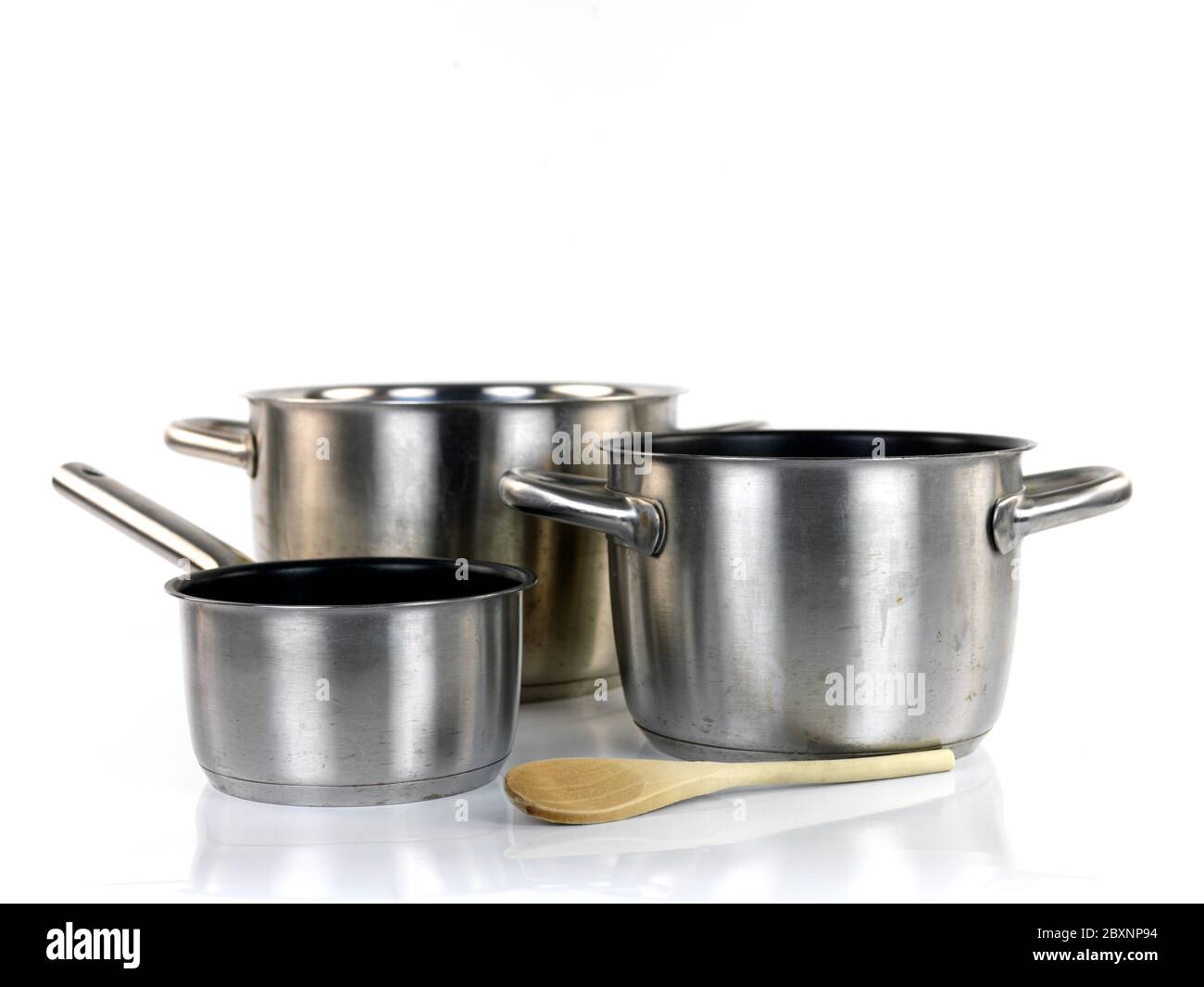 Pots and pans isolayed against a white background Stock Photo - Alamy