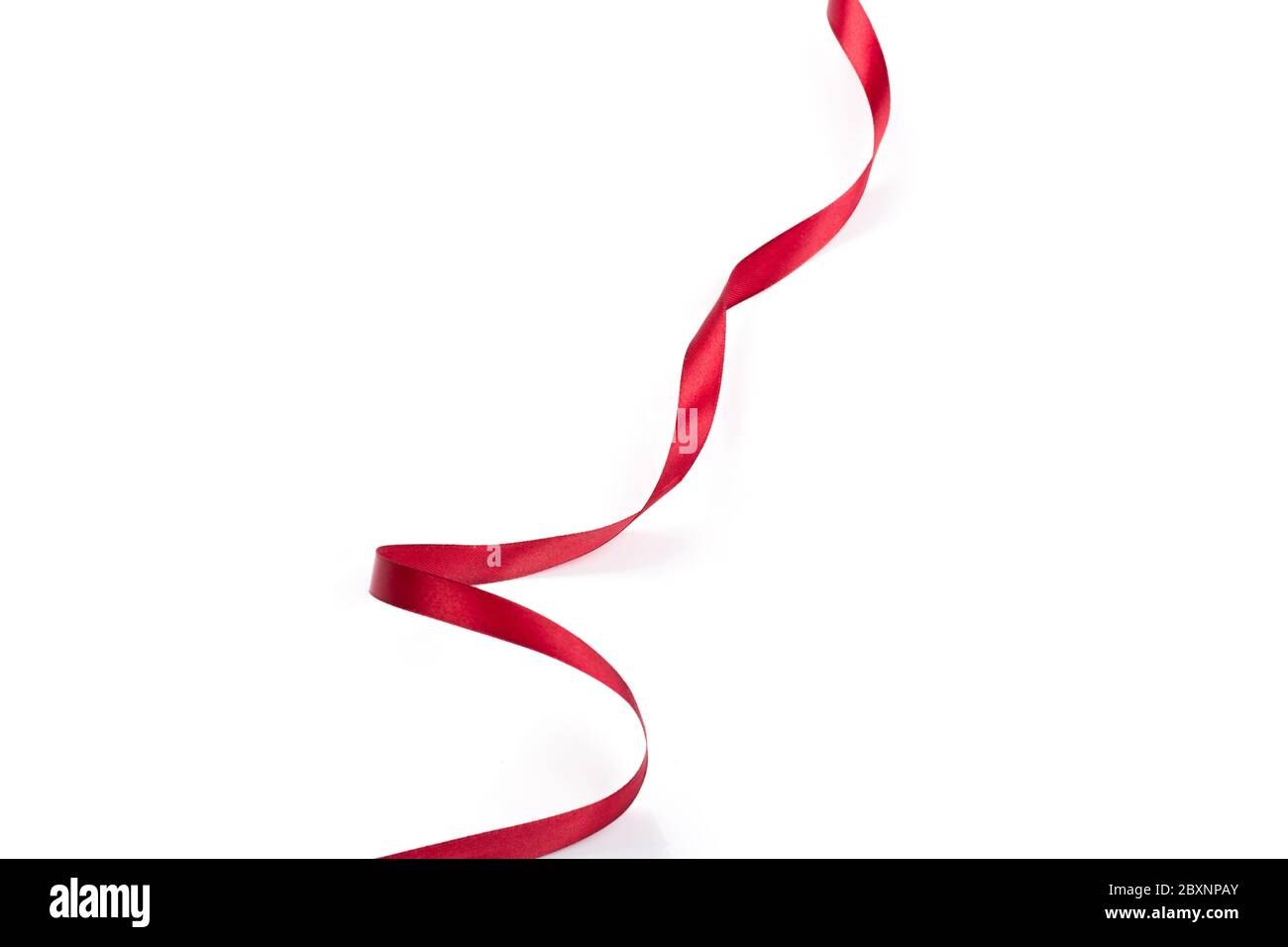 Red ribbon isolated on white background Stock Photo - Alamy