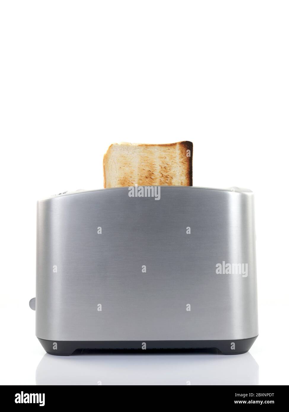 Plain white toast in a toaster isolated against a white background ...