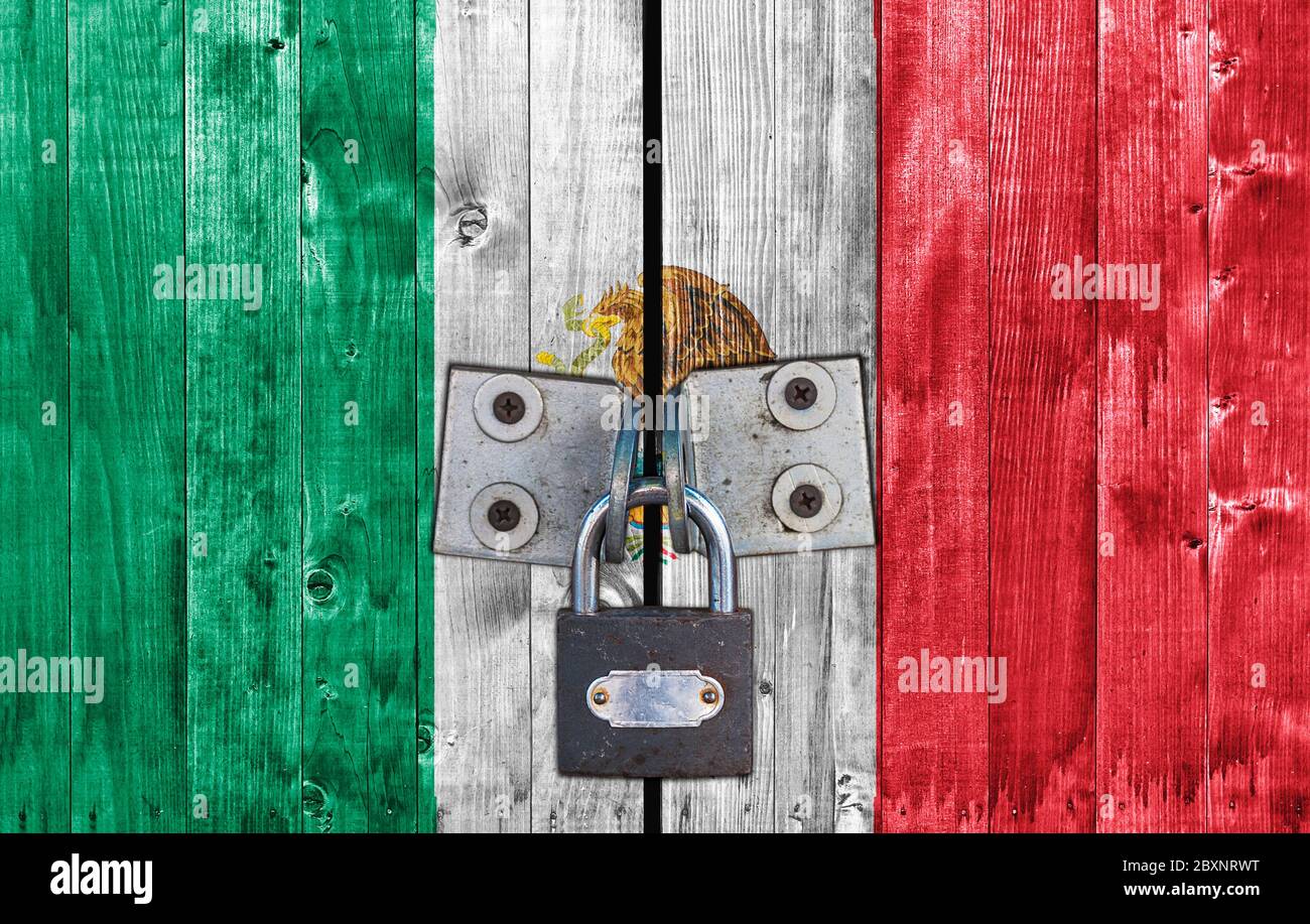 Mexico flag on door with padlock Stock Photo - Alamy