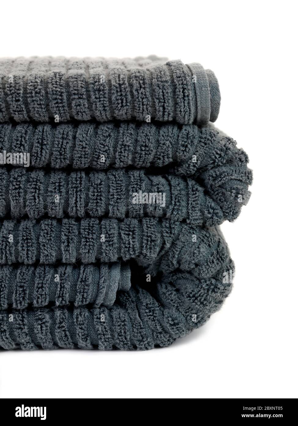 A stack of bath towels isolated against a white background Stock Photo ...