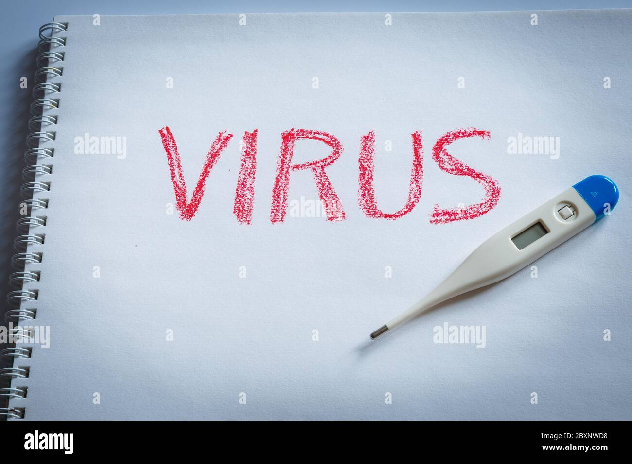 The inscription virus in red letters. The concept of viral diseases and ...