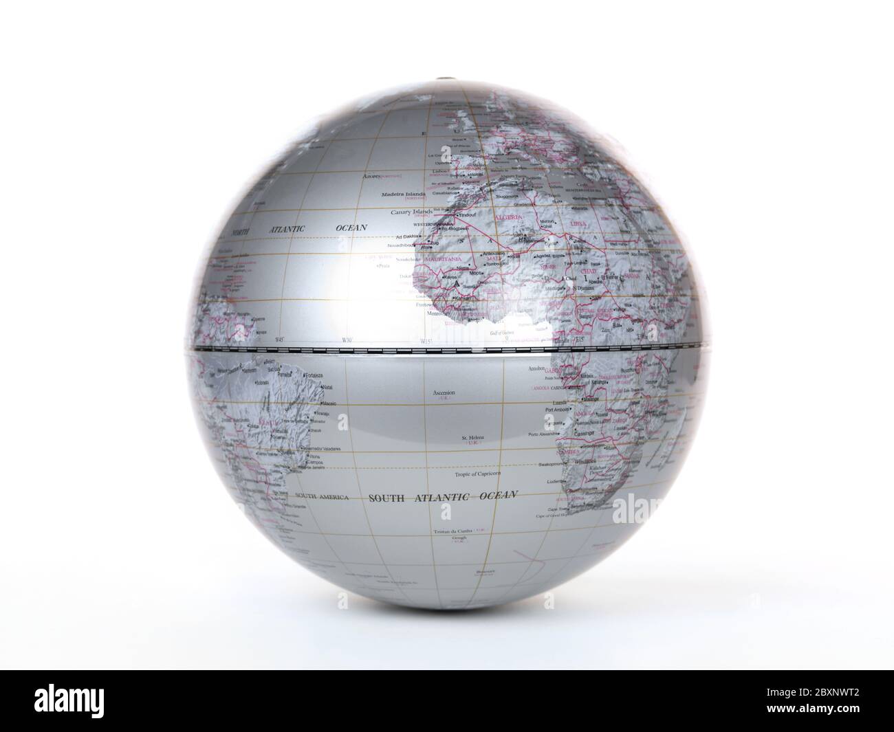A world globe isolated aqainst a white background Stock Photo - Alamy