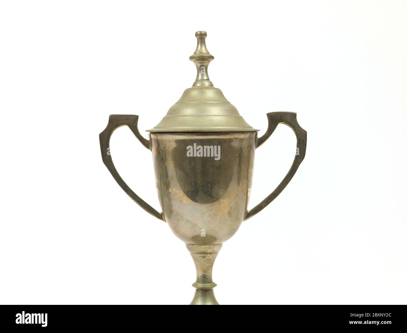 An old tarnished trophy isolated against a white background Stock Photo ...