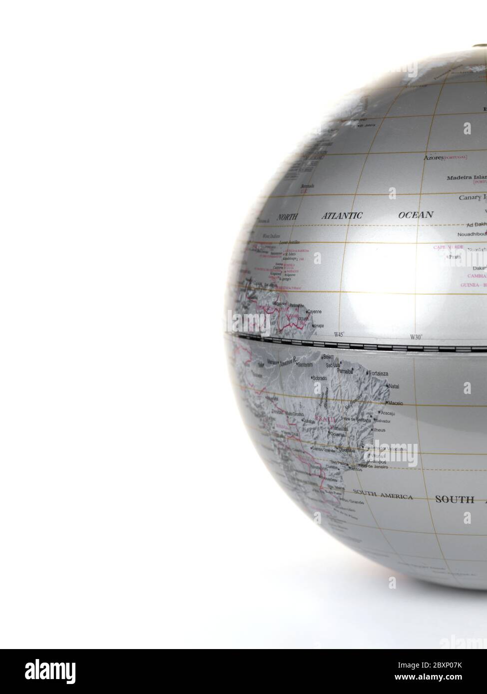 A world globe isolated aqainst a white background Stock Photo - Alamy