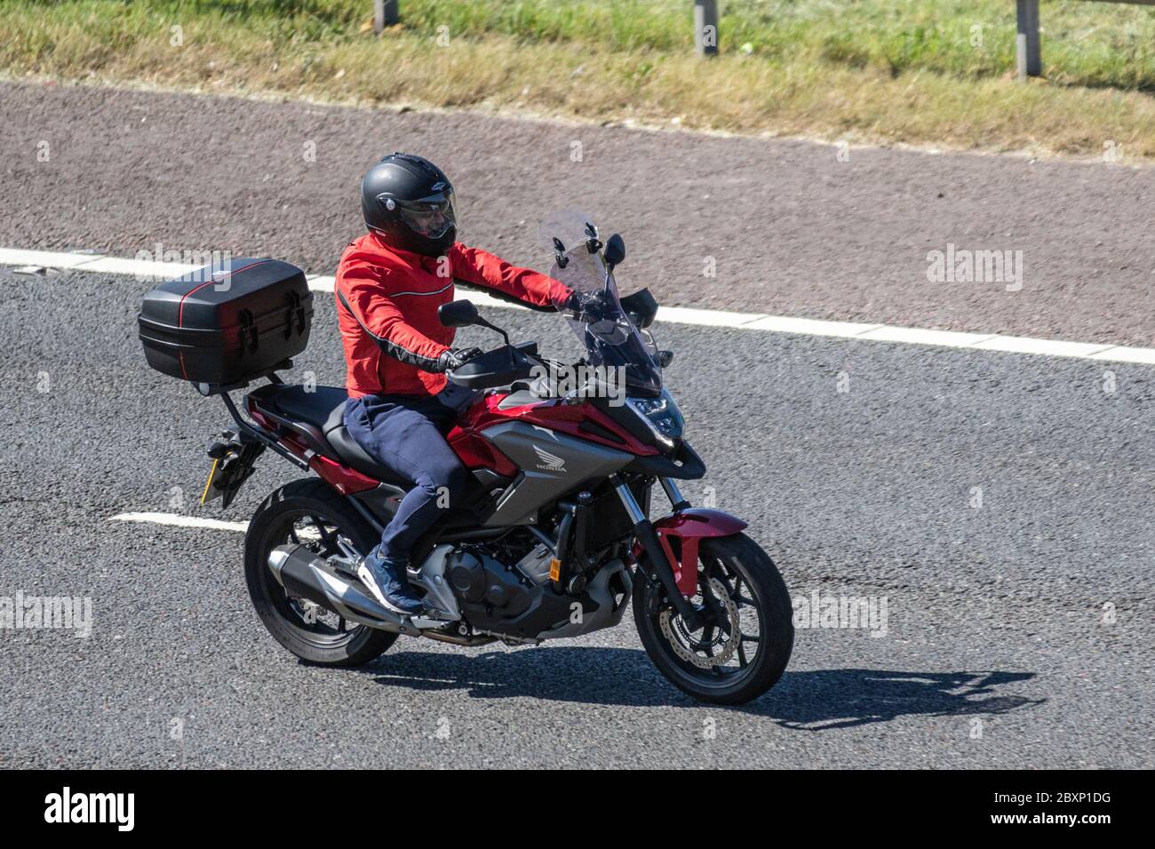 Red Honda Motorbike rider; two wheeled transport, motorcycles, vehicle ...
