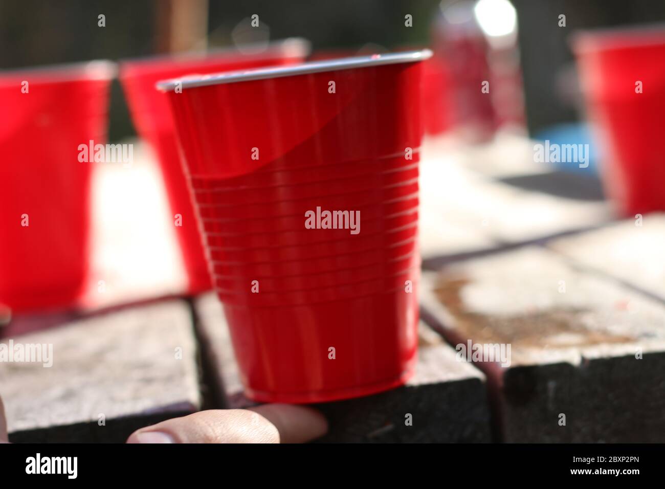 Red party cups themed background template. White backdrop. Alcohol ...