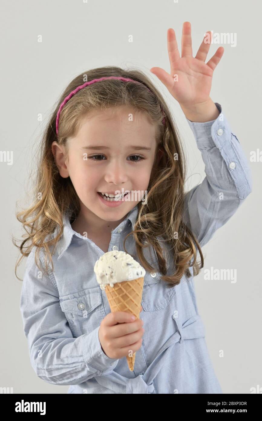 Little Girl Singing with A Ice Cream Microphone In Waffle Cone Stock ...