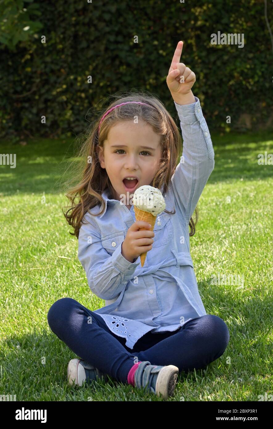Little Girl Singing with A Ice Cream Microphone In Waffle Cone Stock ...