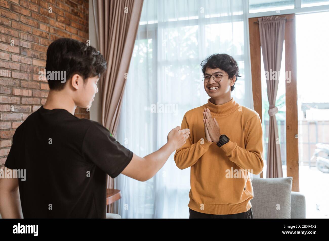 Asian male guests refuse to shake hands with male hosts when visiting ...