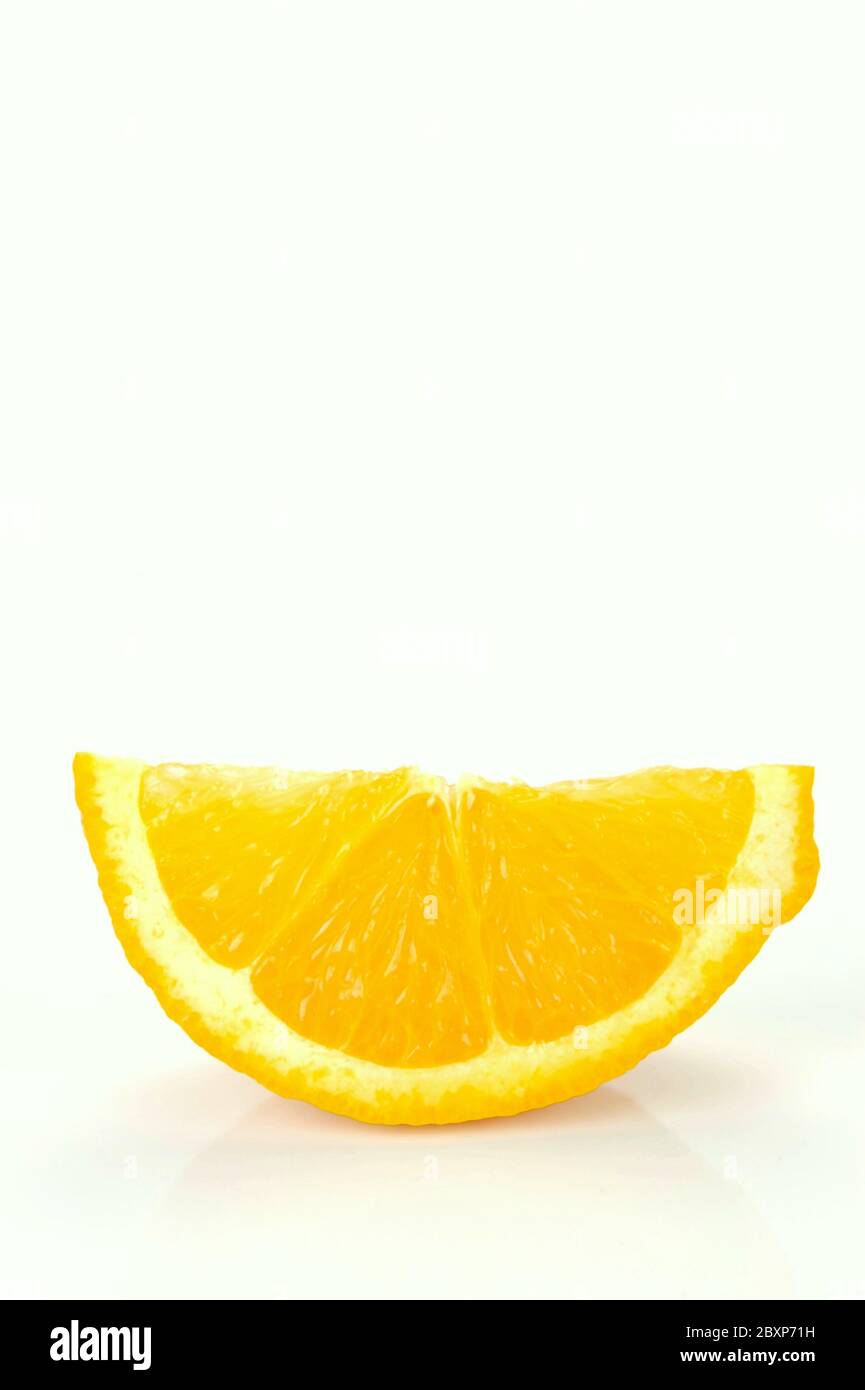 Orange quarters isolated against a white background Stock Photo - Alamy