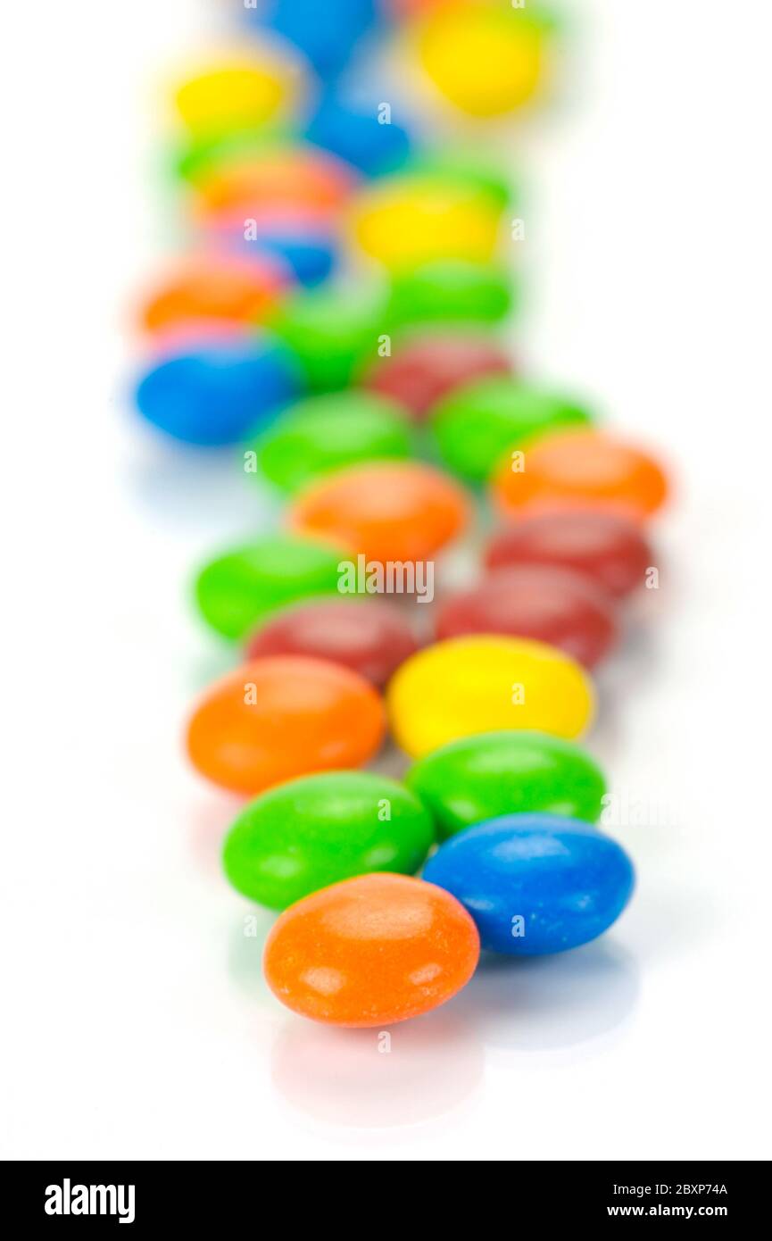 Candy coated chocolates hi-res stock photography and images - Alamy