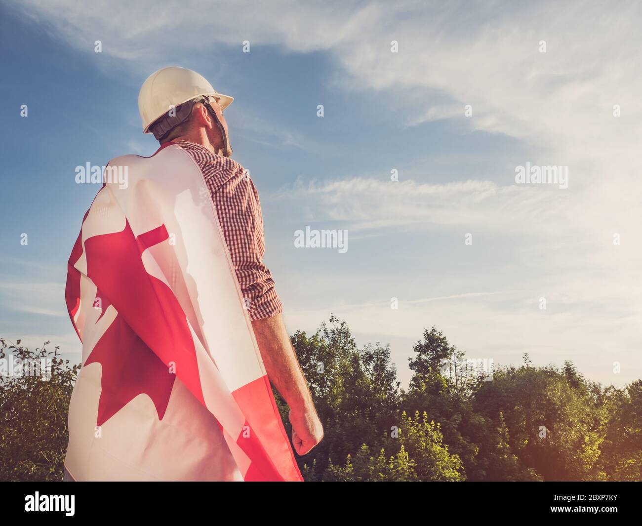 Young engineer, white hardhat and Canadian Flag Stock Photo - Alamy