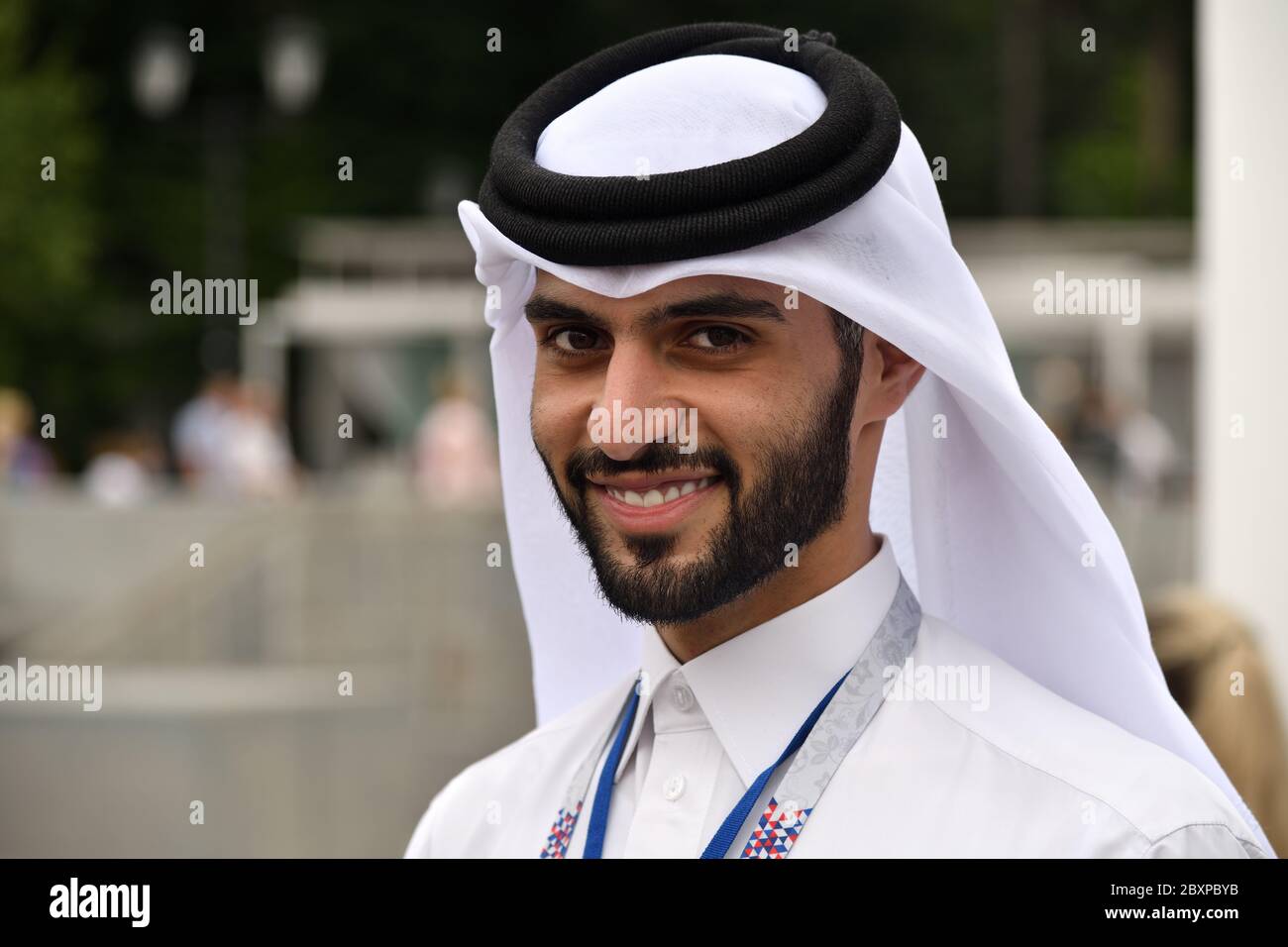 Moscow, Russia - July 14, 2018: Qatari man in traditional clothes looks ...